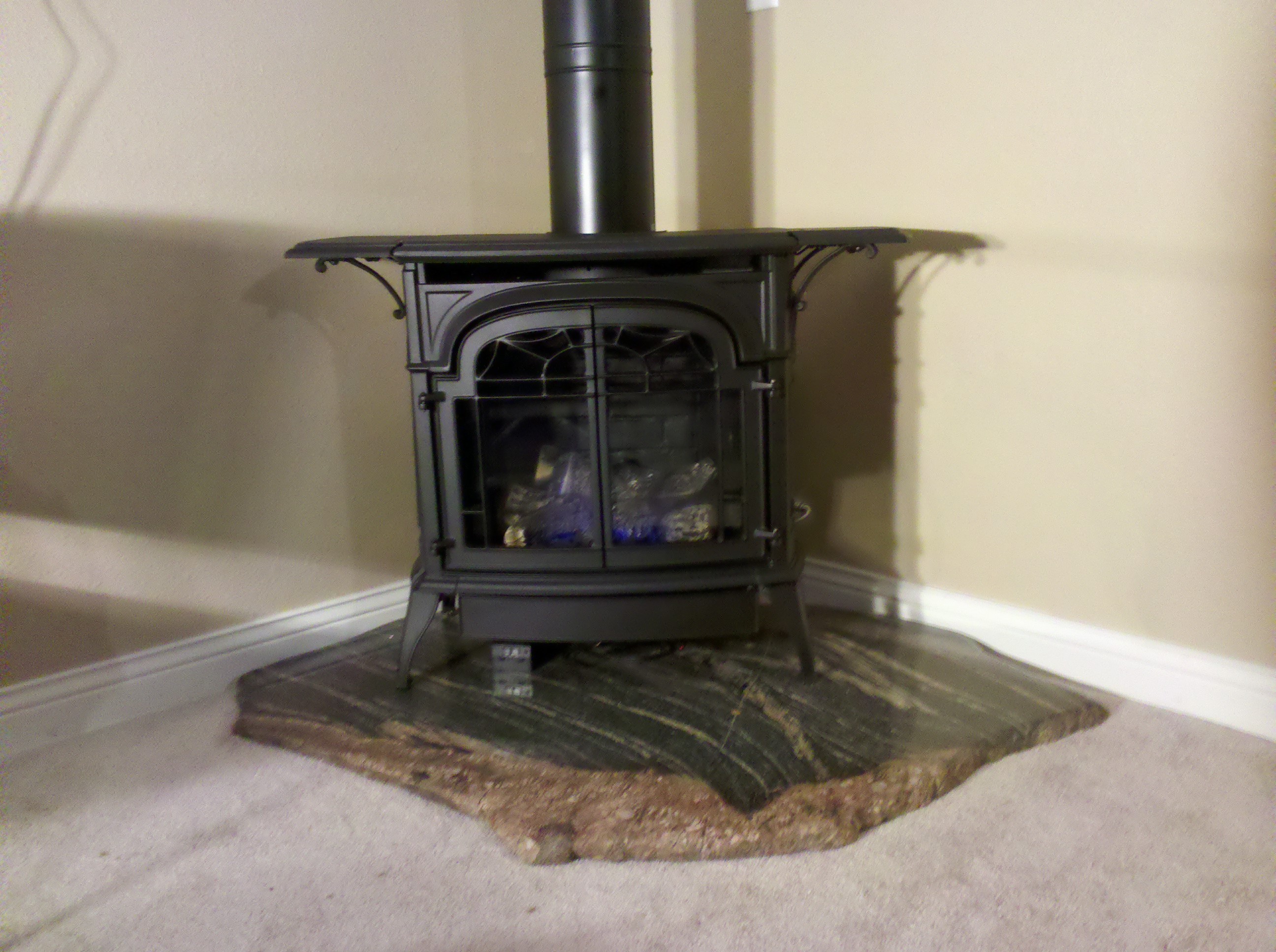 Our Work - Freestanding Gas Fireplace - Custom Stone Pad